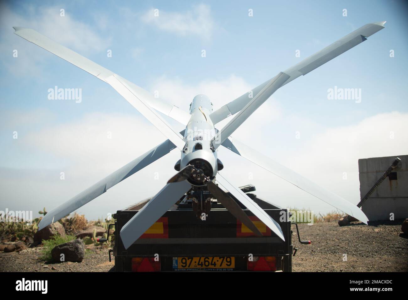 A U.S. Marine Corps Hero-400 loitering munition drone is staged before ...