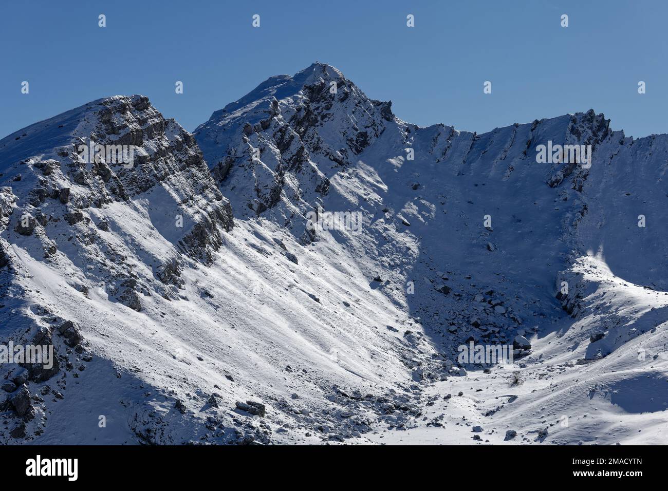 Amazing view of different mountain peaks with snow during winter ...