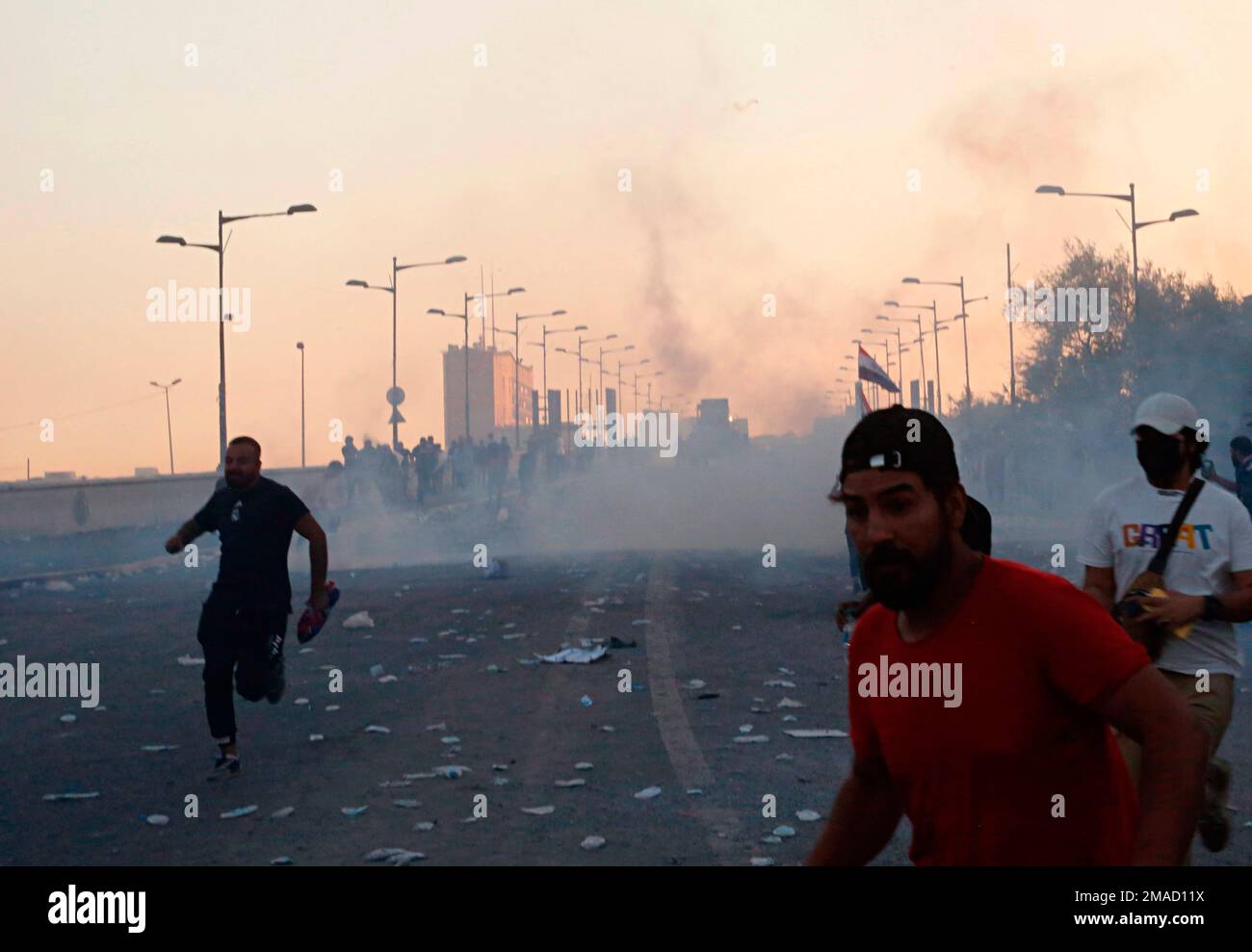 Security forces fire tear gas during a demonstration in Tahrir Square ...