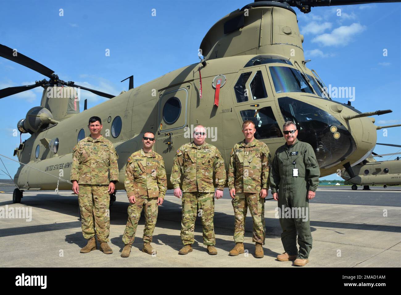 (Left to right) Staff Sgt. Kyle Waller of the Illinois National Guard’s ...