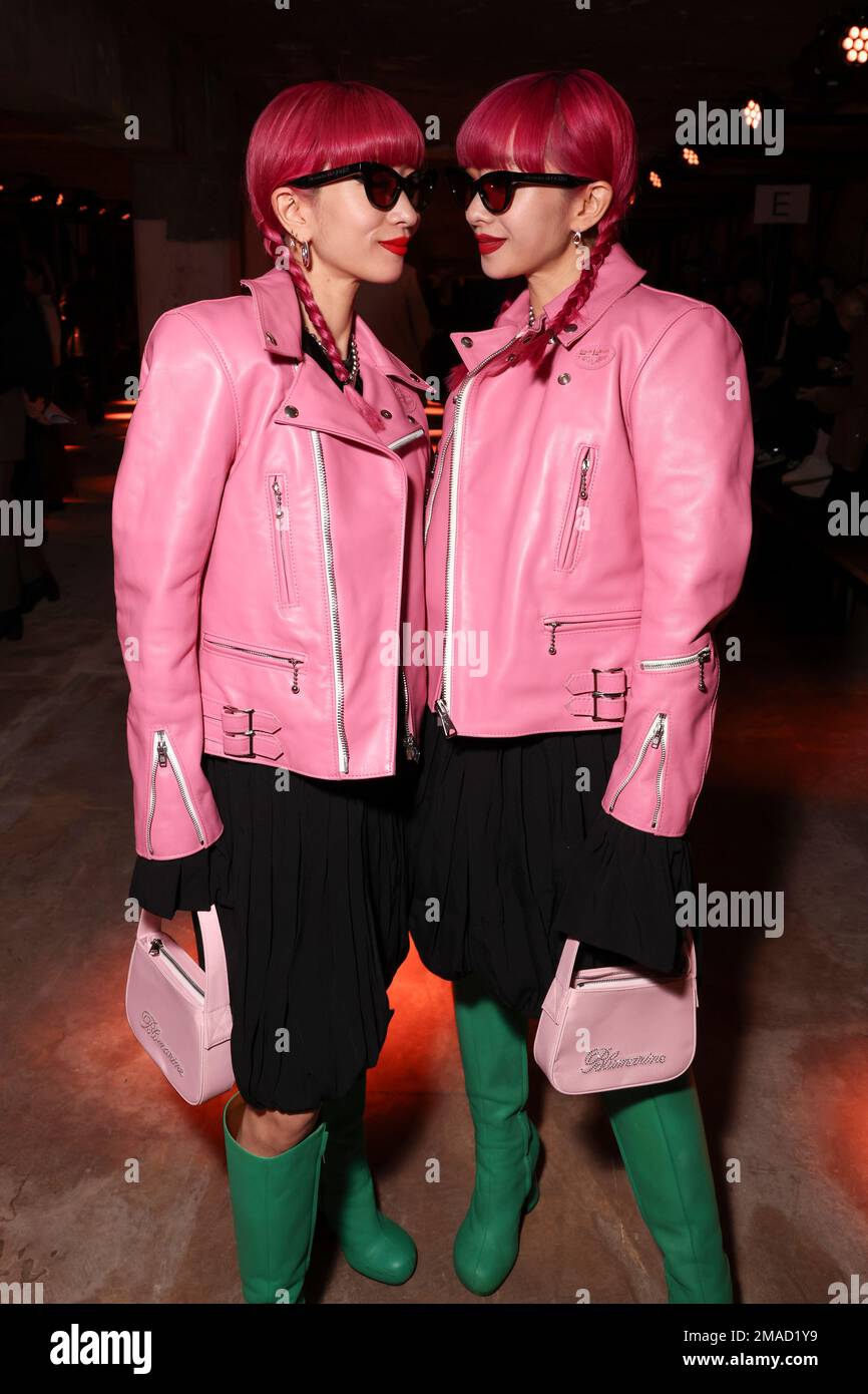 Amiaya pose for a photographer before the Dries Van Noten ready-to-wear ...