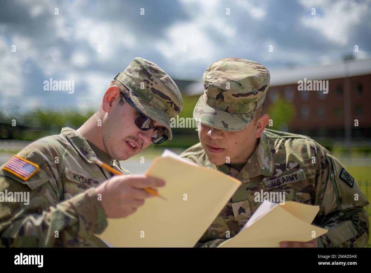 U.S. Army Pvt. Dustin Kysar, and Sgt. Laurencio Gonzalez, assigned to U ...