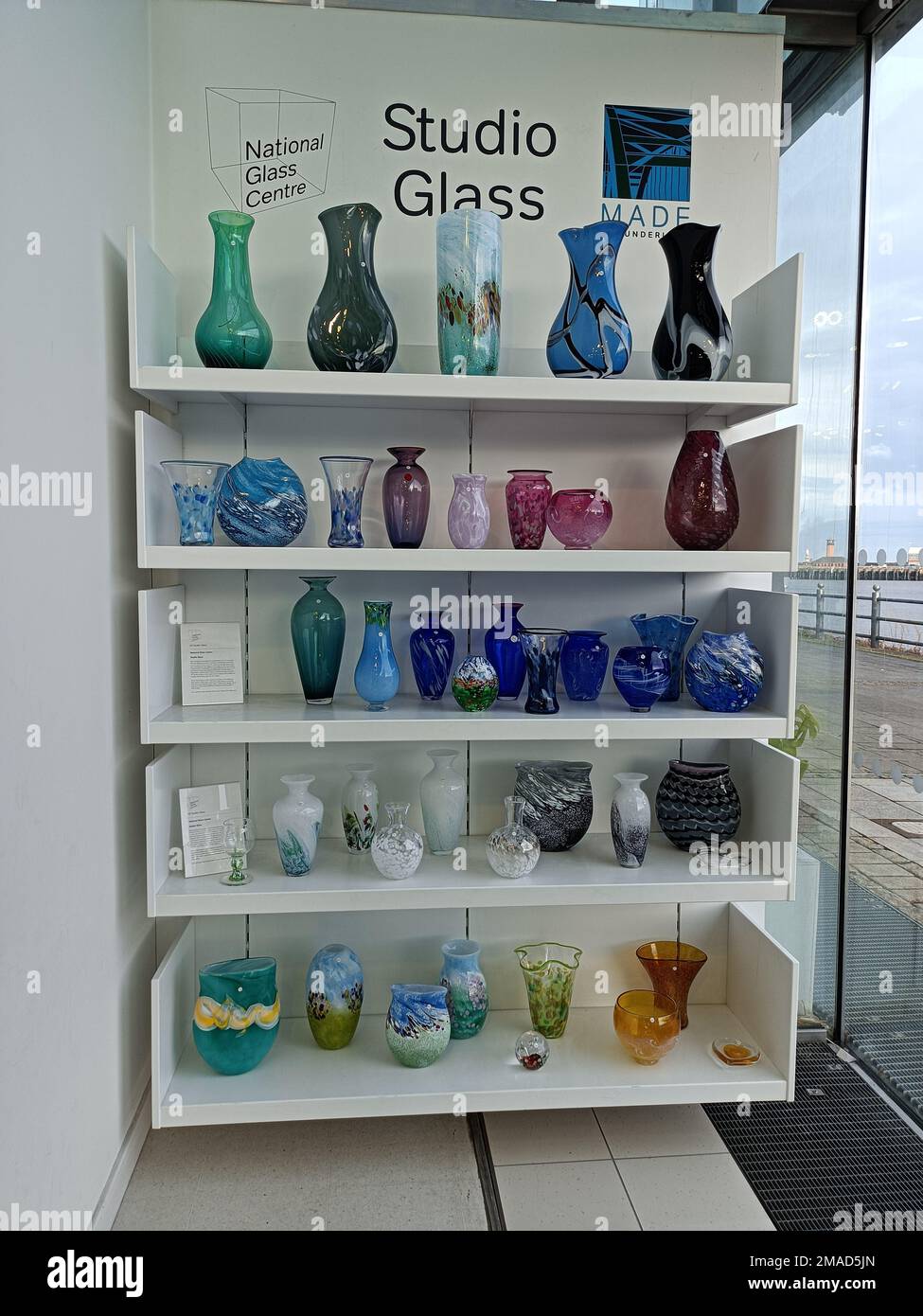 A Studio glass for sale on the shelves Stock Photo - Alamy