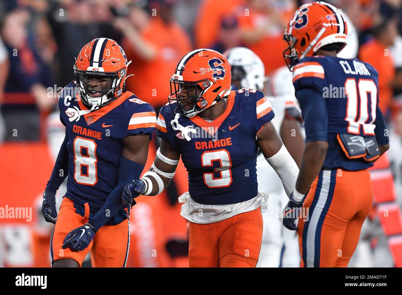 Syracuse defensive back Garrett Williams (8) celebrates with linebacker ...
