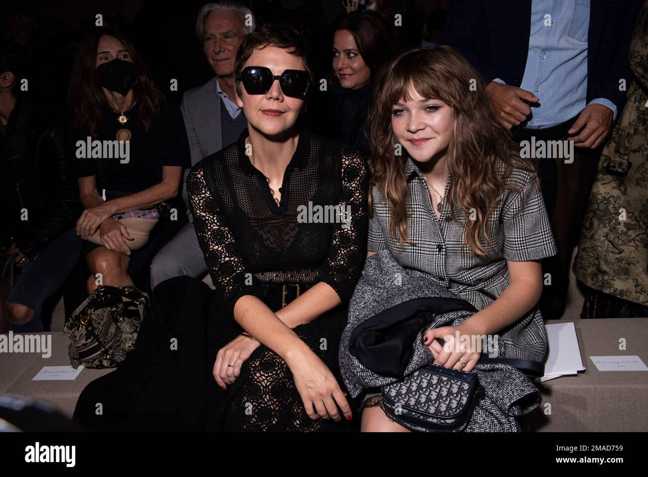 Maggie Gyllenhaal, left, and Ramona Sarsgaard arrive for the Dior ...