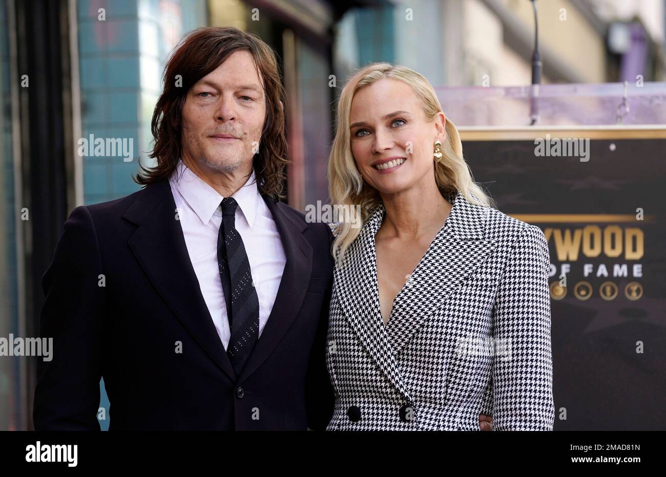 Actor Norman Reedus, left, poses with his partner, actor Diane Kruger ...