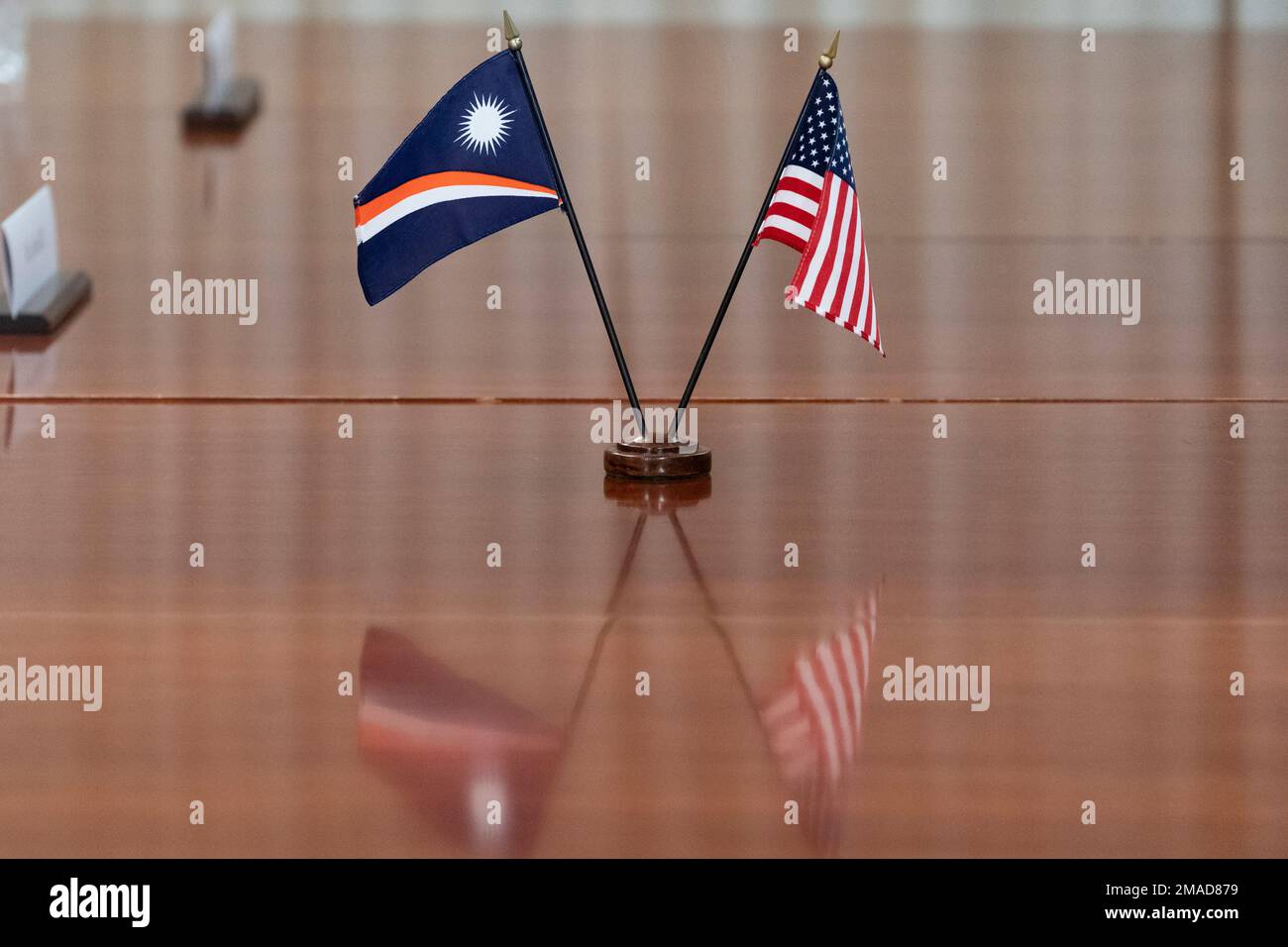 The countries flags are seen during a meeting with Marshall Islands ...