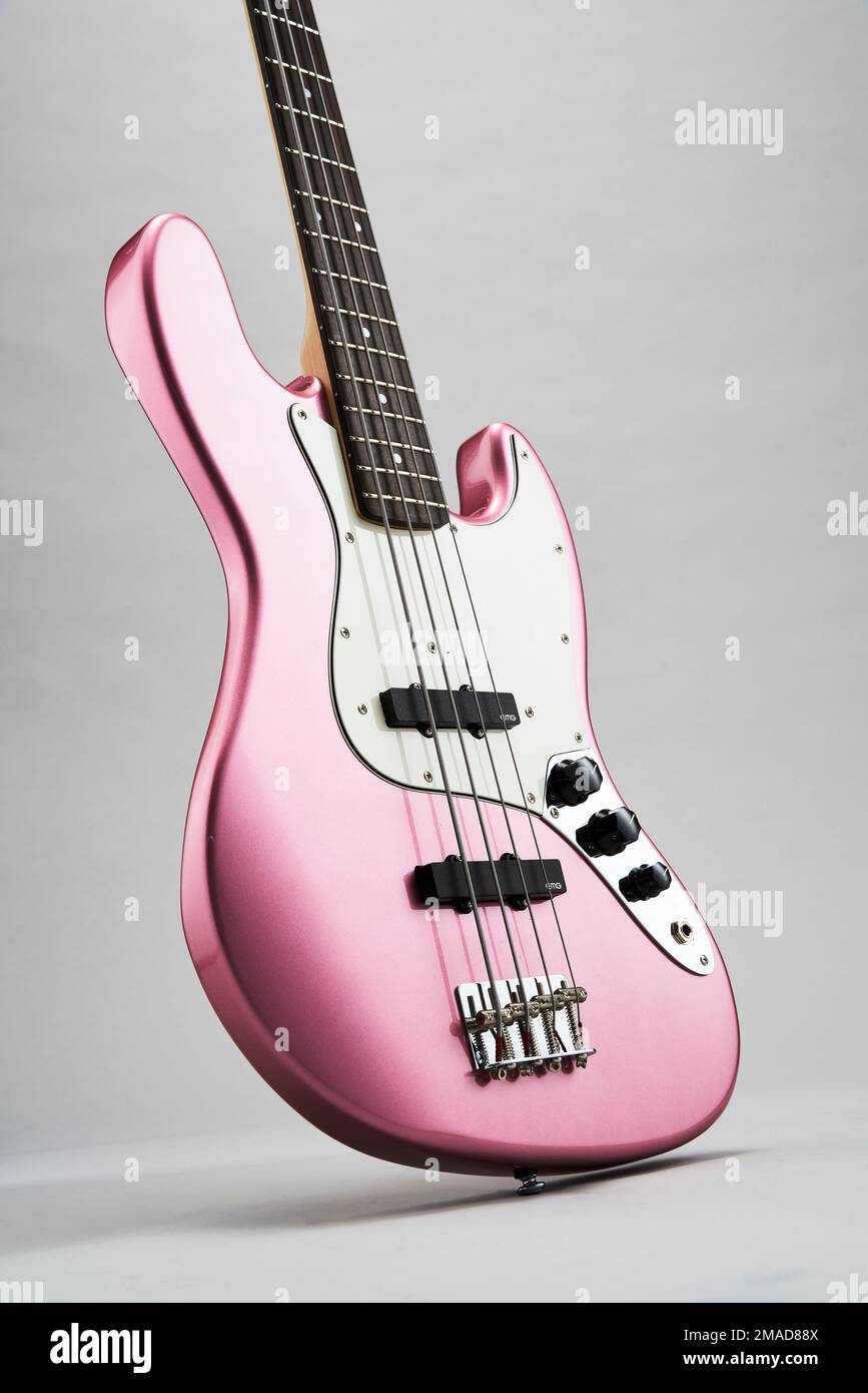 Bass Collection Betsy Guy Pratt bass guitar in pink finish Stock Photo ...