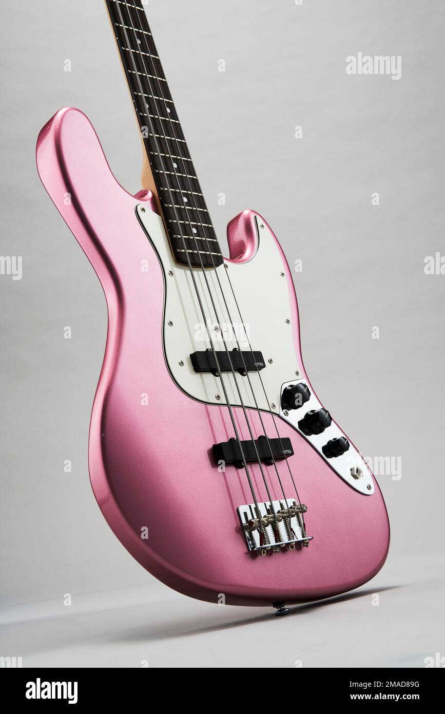 Bass Collection Betsy Guy Pratt bass guitar in pink finish Stock Photo ...