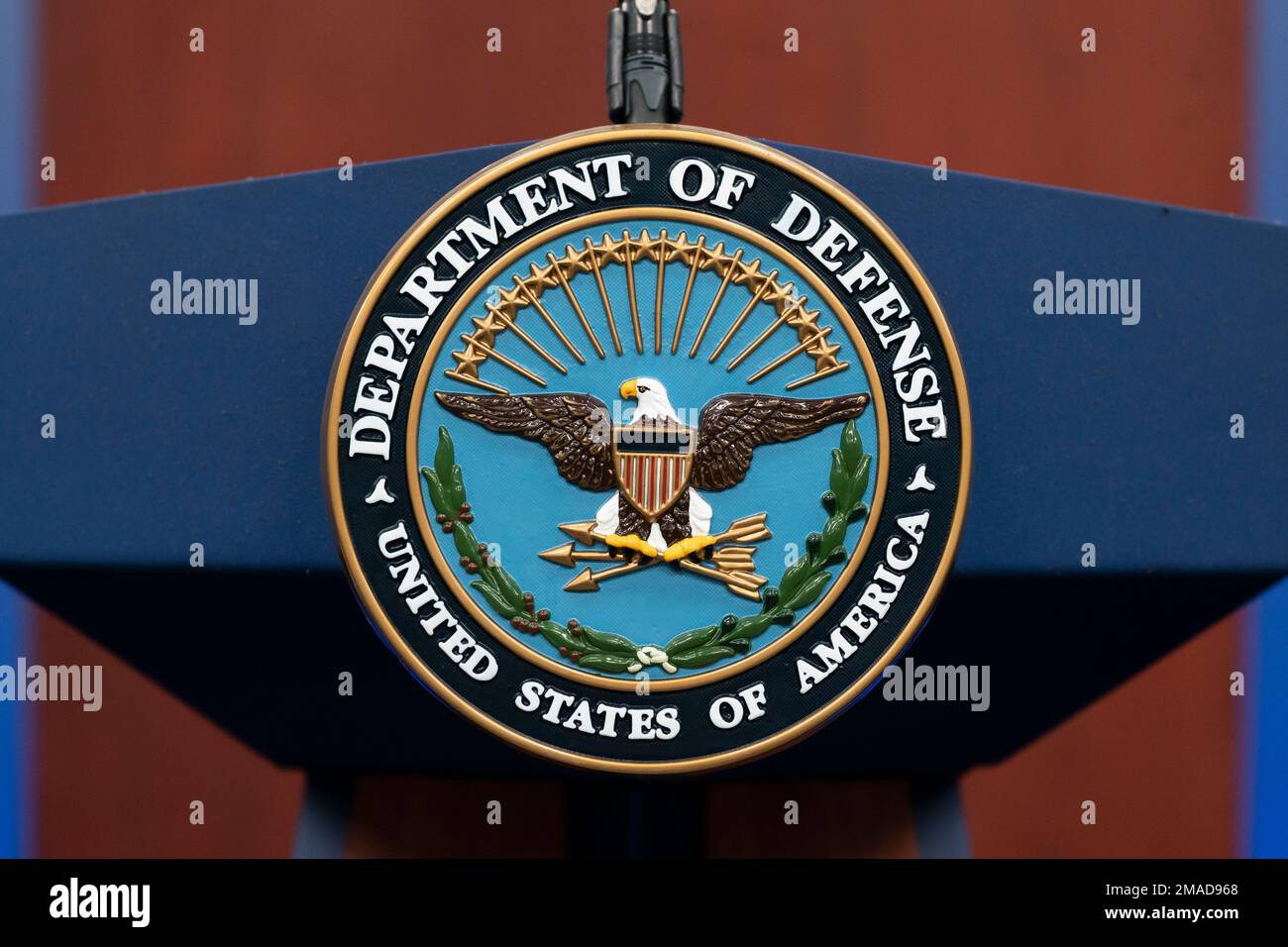 The seal of the Department of Defense is seen on the podium before ...