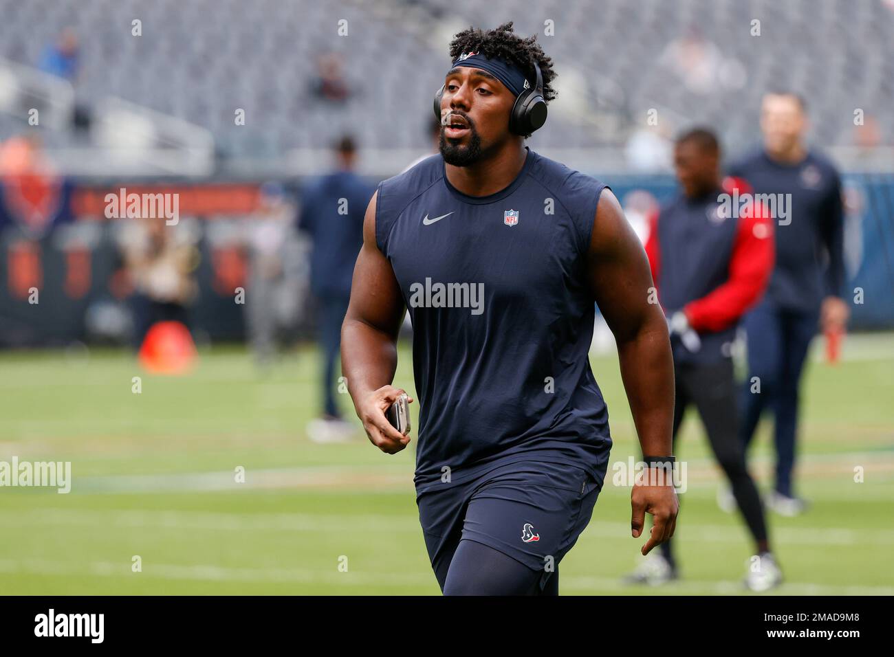 Houston Texans defensive tackle Thomas Booker IV (56) warms up prior to ...