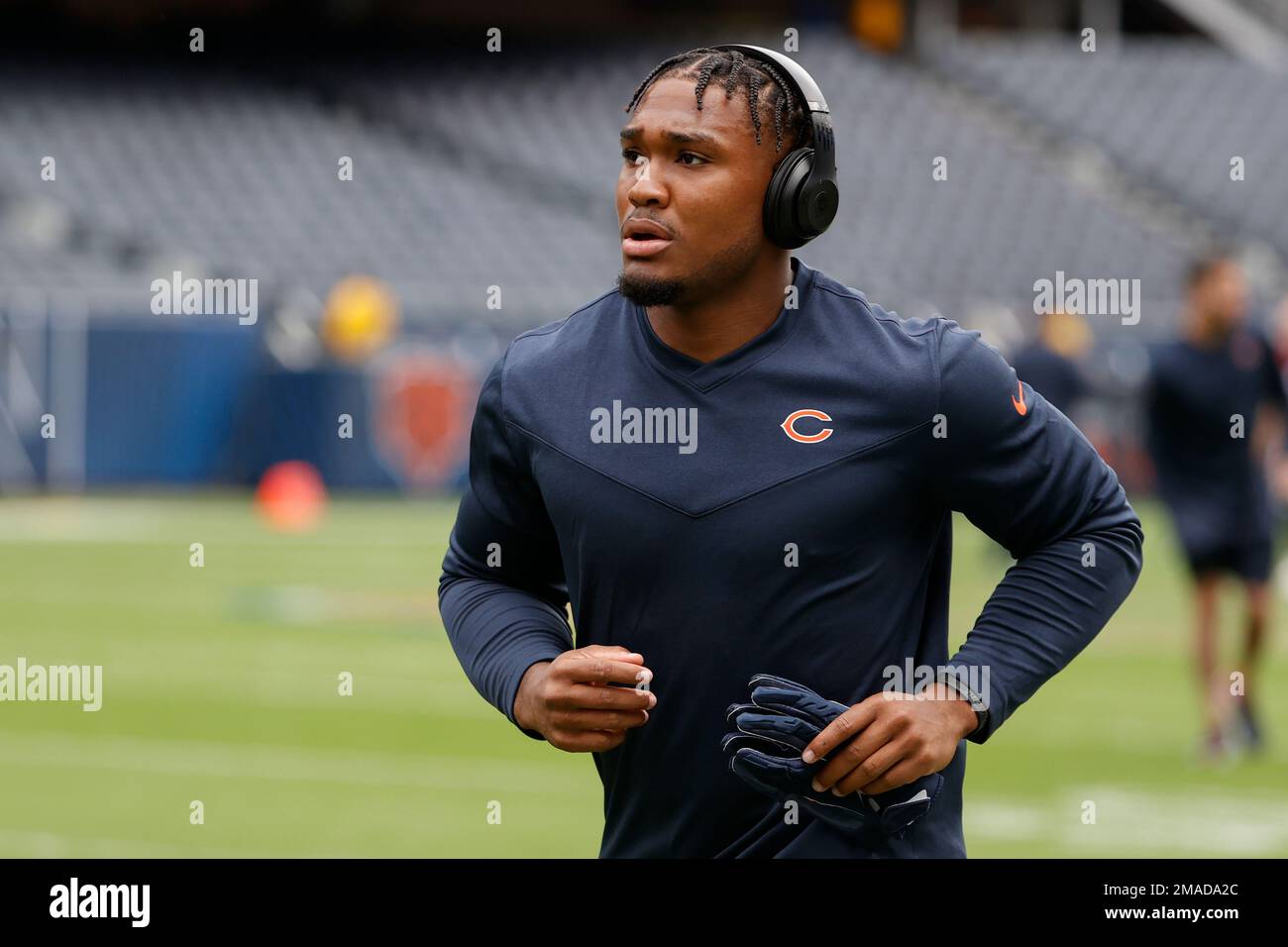 Chicago Bears running back Khalil Herbert (24)warms up prior to an NFL ...