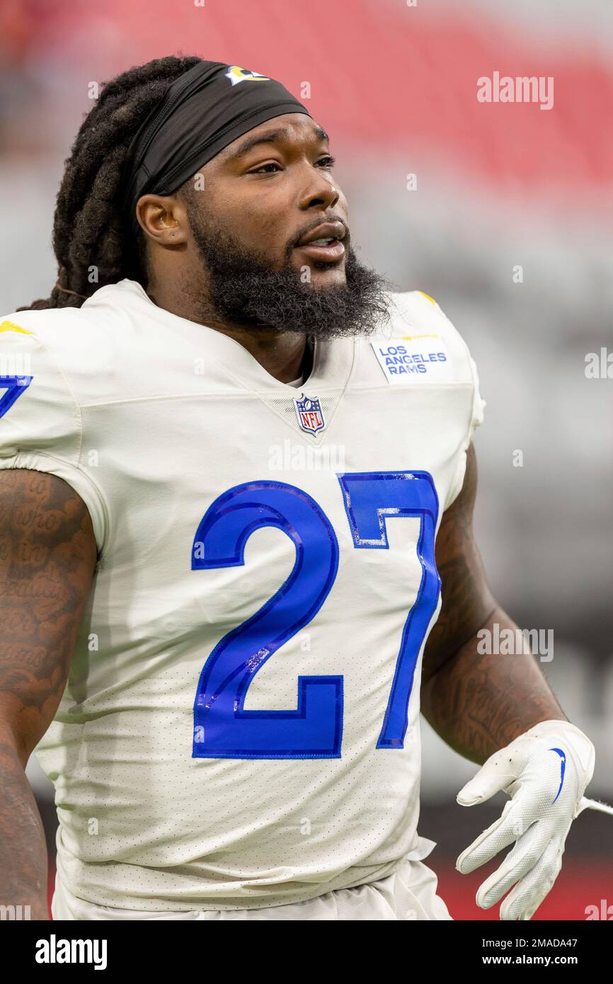 Running back (27) Darrell Henderson, Jr. of the Los Angeles Rams warms ...