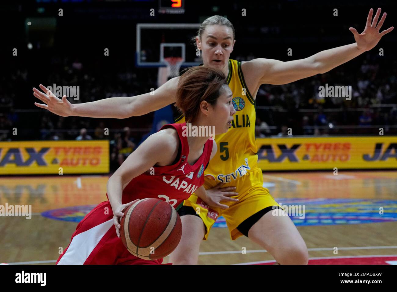 Japan's Saori Miyazaki runs past Australia's Darcee Garbin during their ...