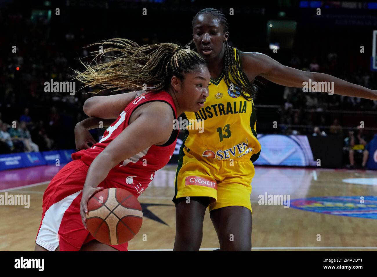 Japan's Monica Okoye runs past Australia's Ezi Magbegor during their ...