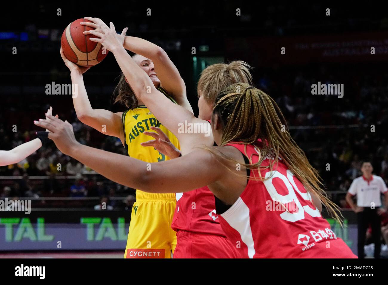 Australia's Kristy Wallace attempts shot on goal as Japanese defenders ...