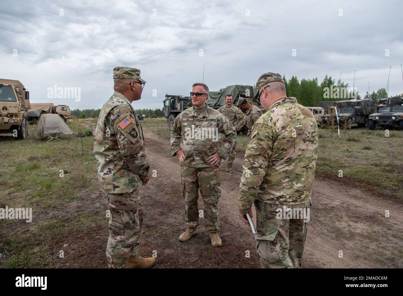 From left, U.S. Army Command Sgt. Maj. William Russell III, senior ...