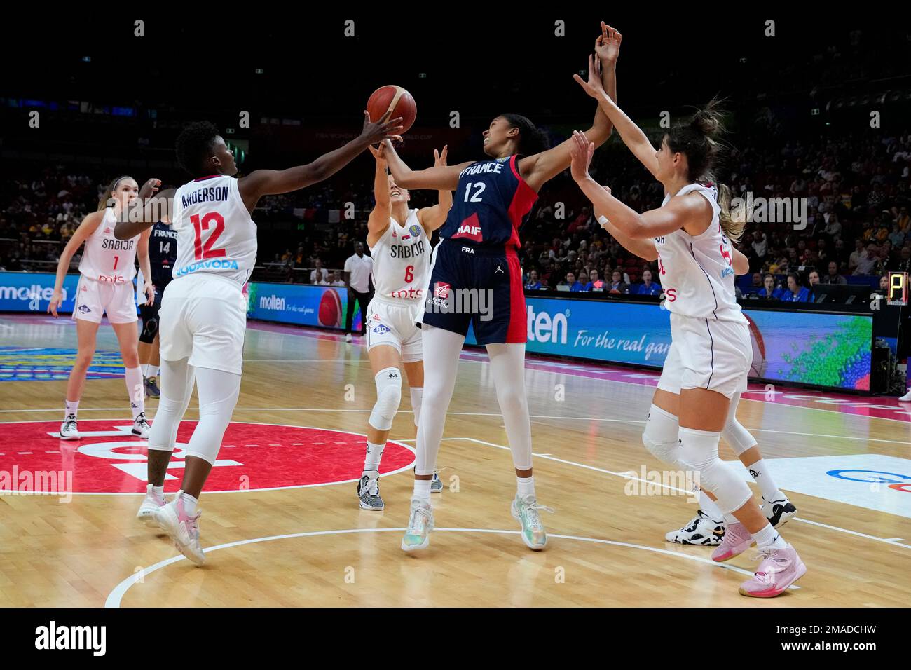 France's Iliana Rupert battles with Serbian defenders for the ball ...