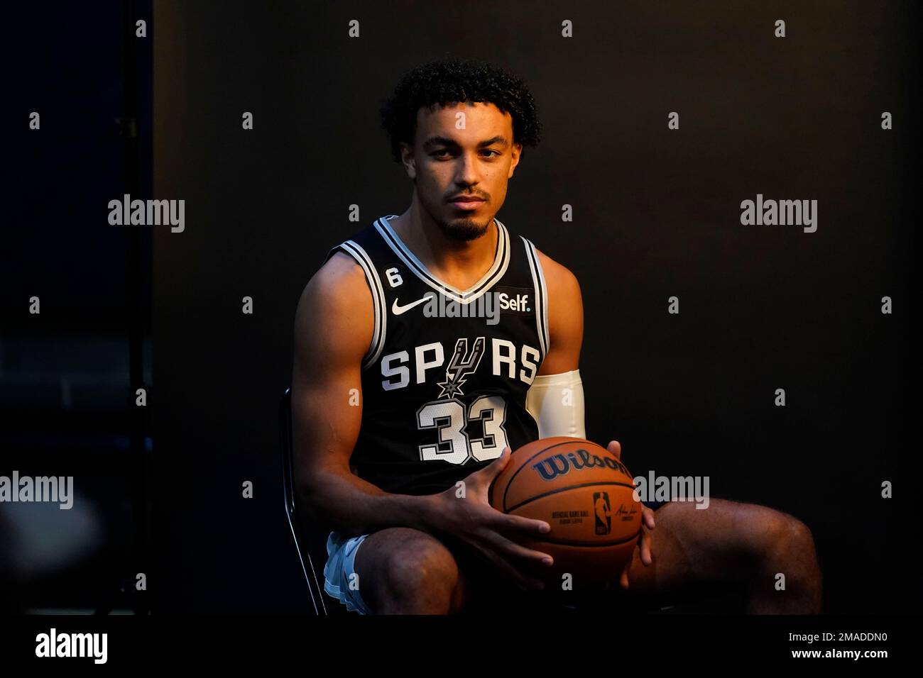 San Antonio Spurs guard Tre Jones (33) poses for photos during the team ...