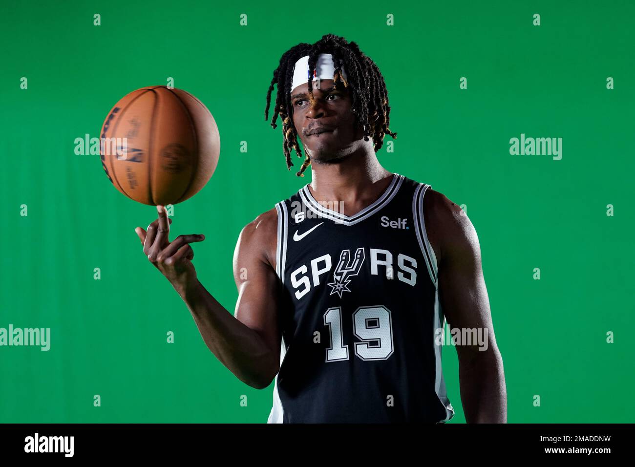 San Antonio Spurs forward Alize Johnson (19) poses for photos during ...