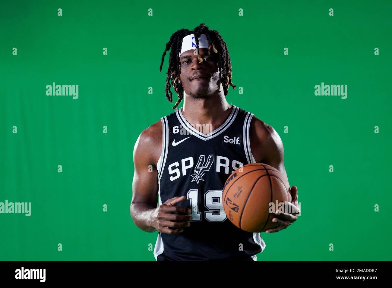 San Antonio Spurs forward Alize Johnson (19) poses for photos during ...