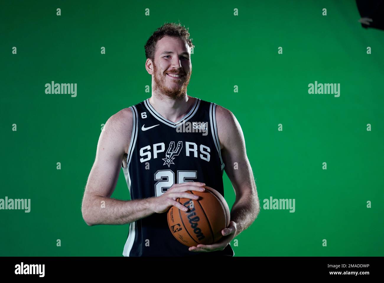 San Antonio Spurs center Jakob Poeltl (25) poses for photos during the ...