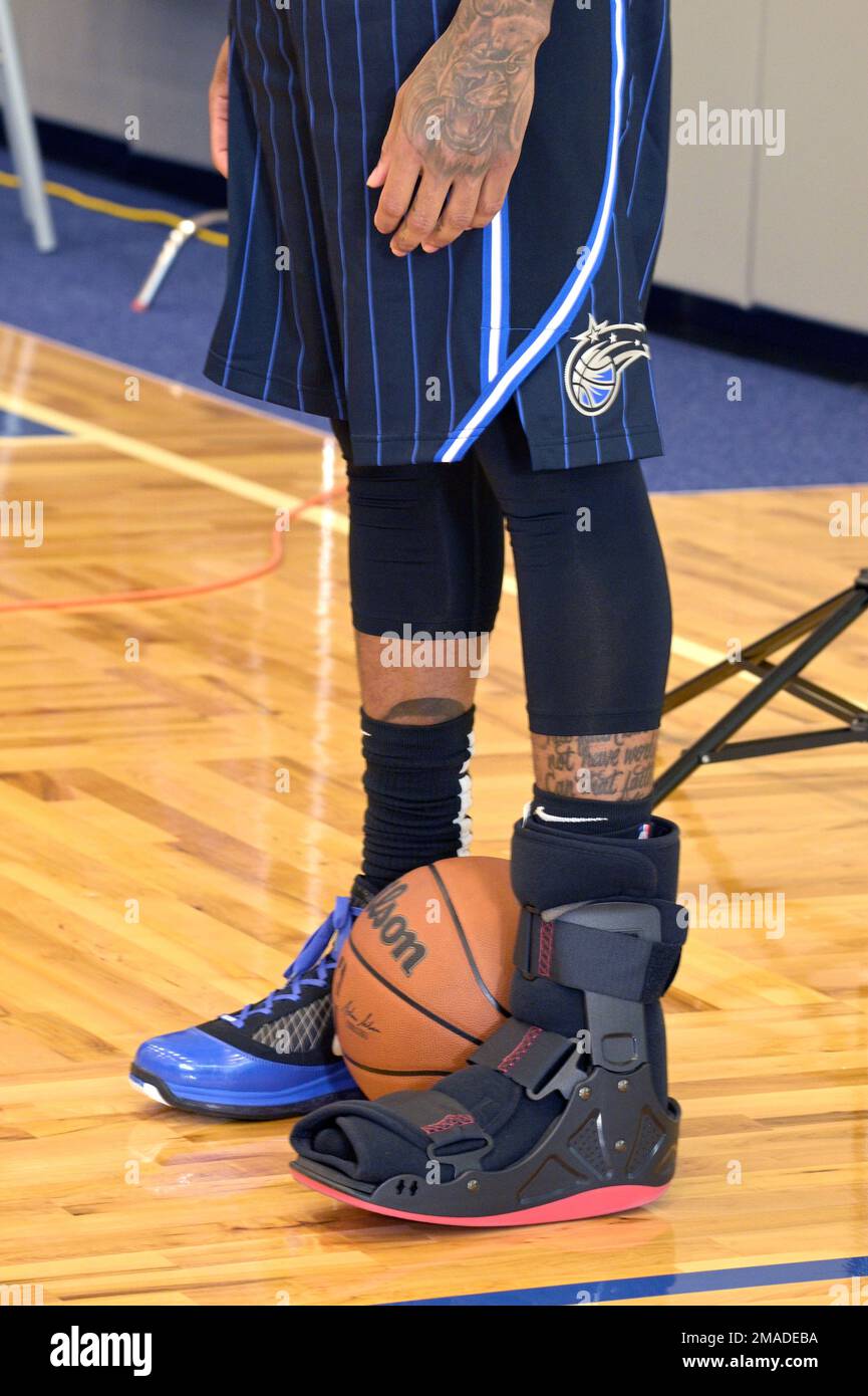 Orlando Magic guard Markelle Fultz (20) wears a foot boot, protecting ...