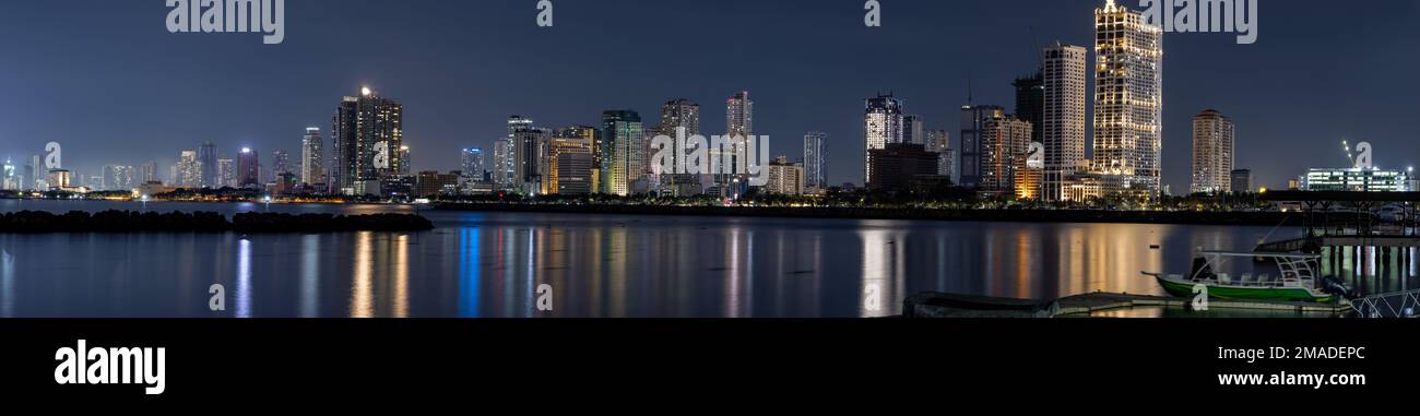 The manila bay at night in Philippines Stock Photo - Alamy