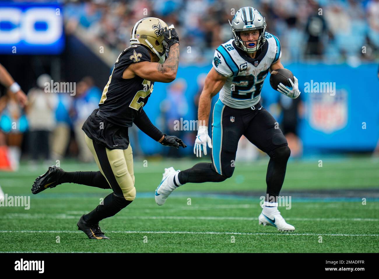 Carolina Panthers running back Christian McCaffrey (22) attempts to ...