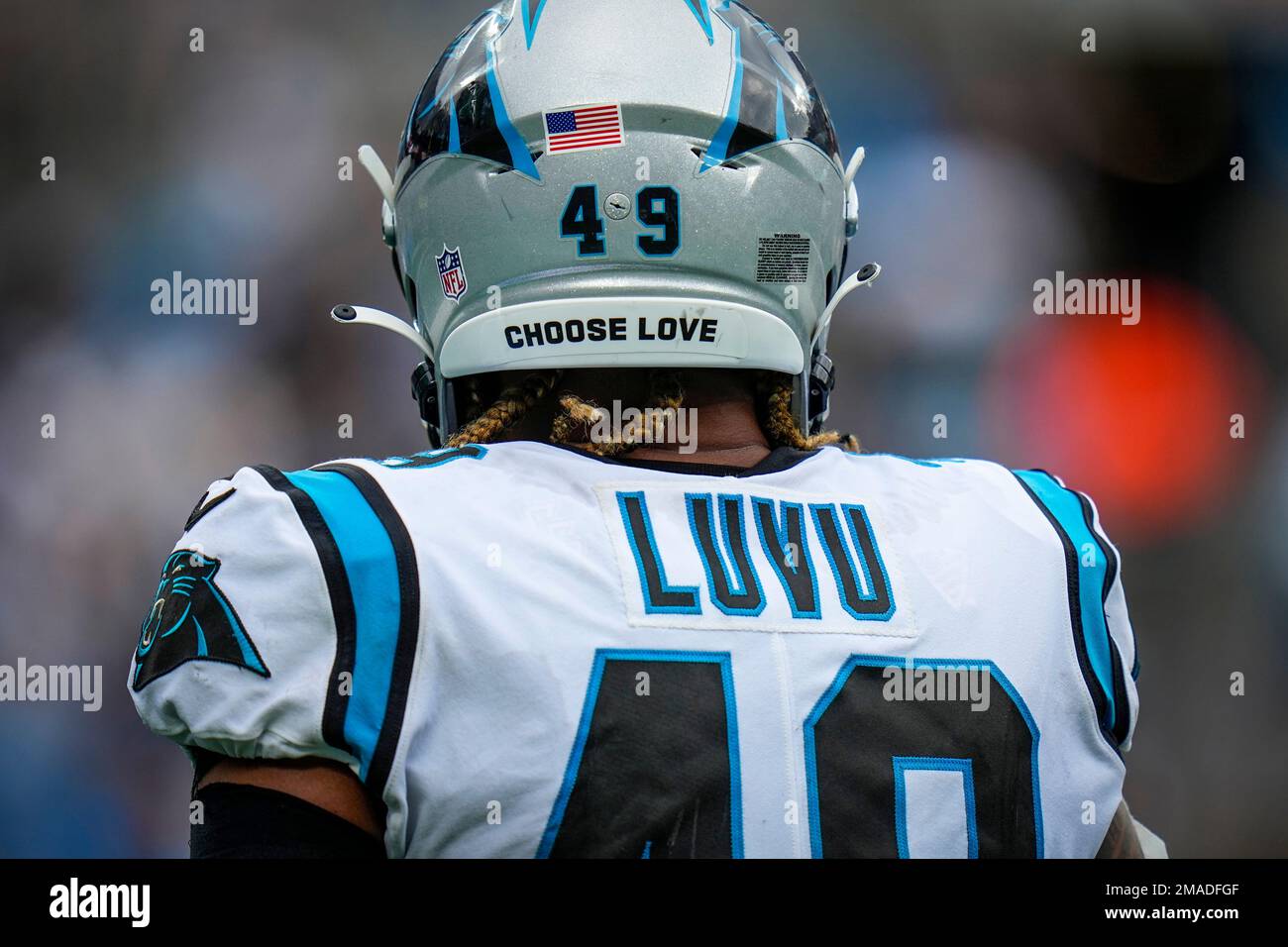 Carolina Panthers linebacker Frankie Luvu (49) displays "Choose Love ...