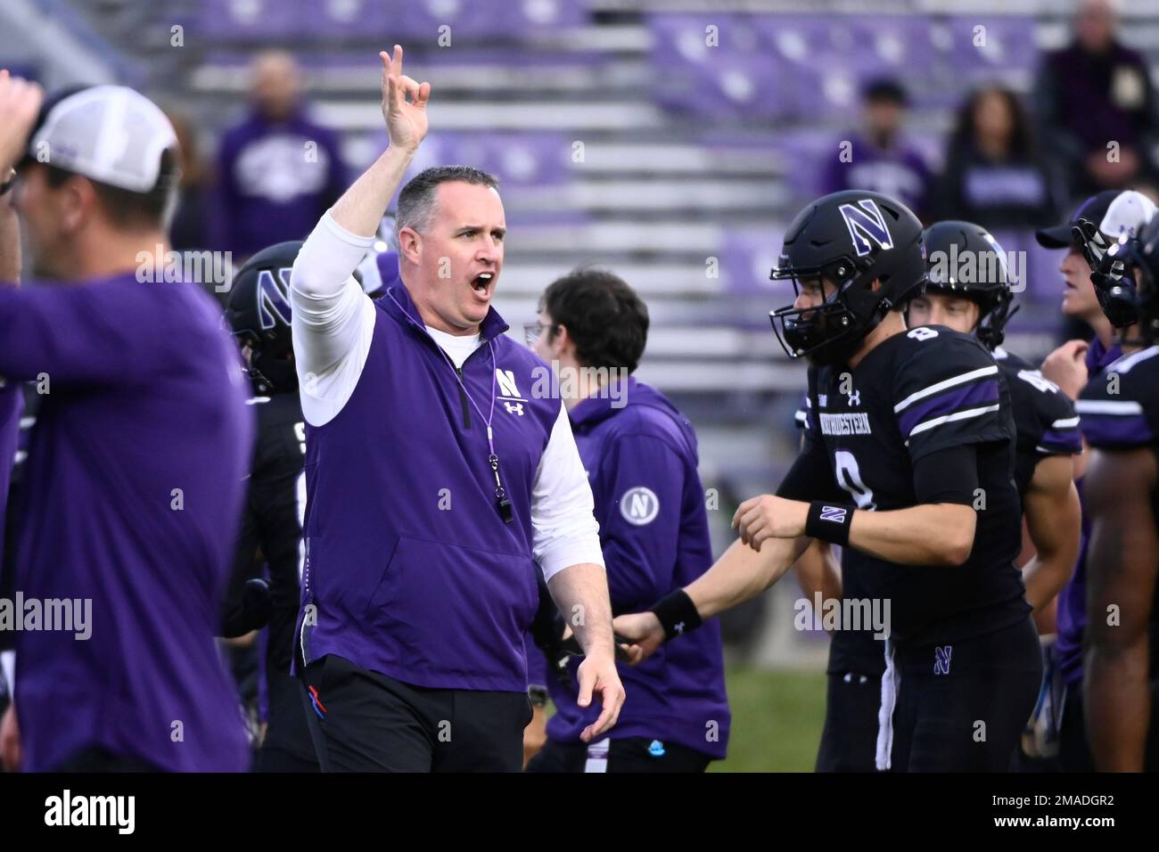 Northwestern head football coach Pat Fitzgerald directs the team before ...