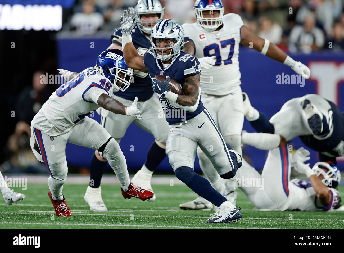 New York Giants safety Julian Love (20) runs the ball against New York ...