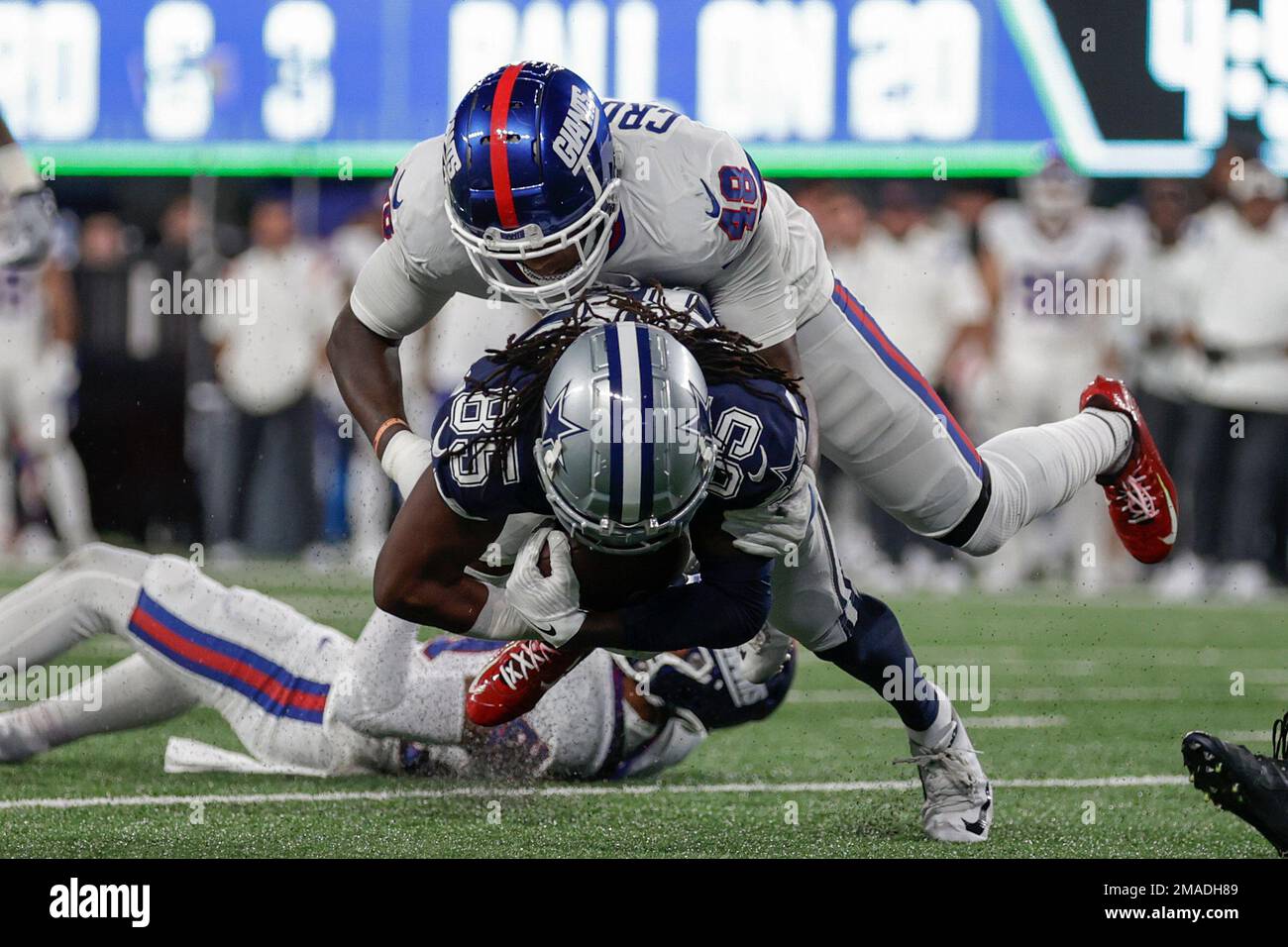 New York Giants linebacker Tae Crowder (48) tackles Dallas Cowboys wide ...