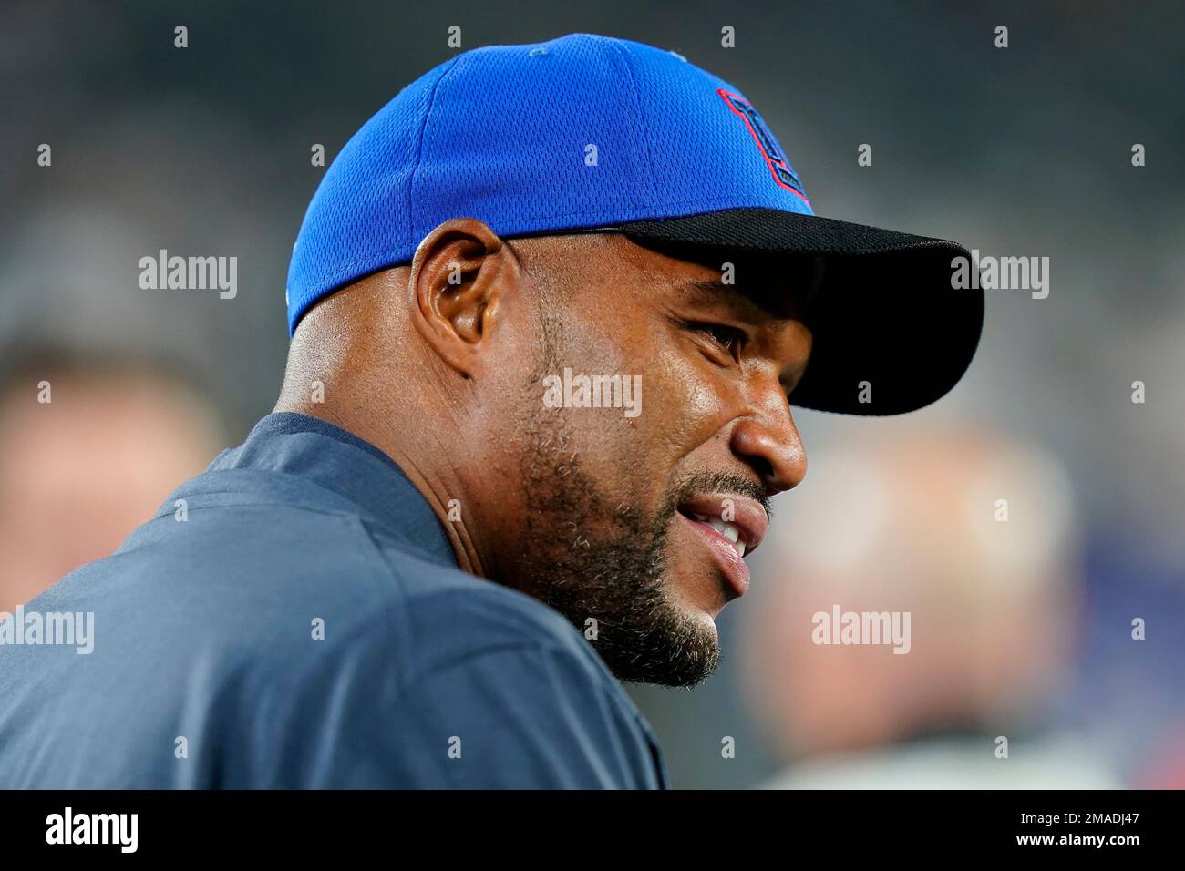 Former New York Giants player Michael Strahan walks on the field before ...
