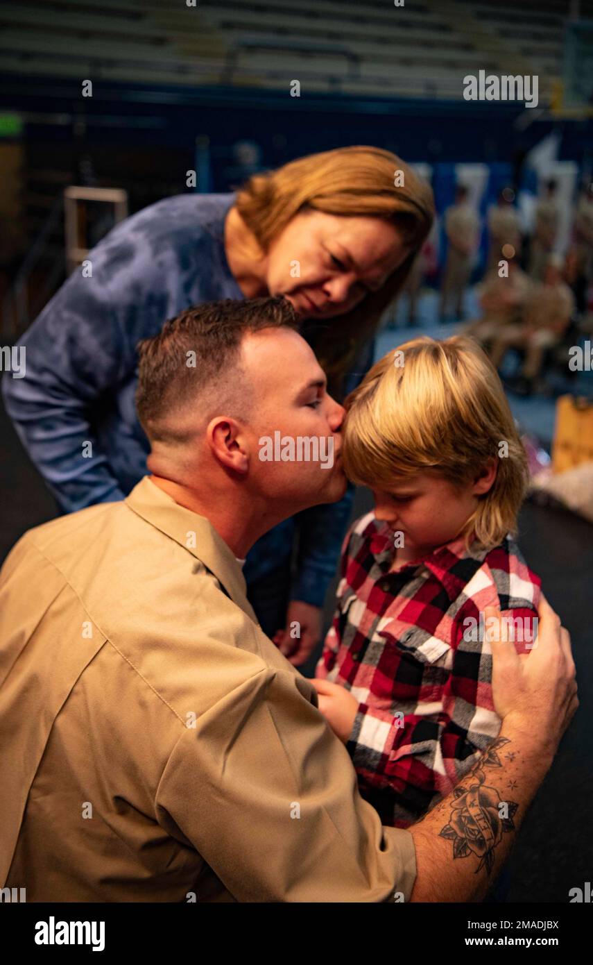 Chief Logistics Specialist Phillip Mears is pinned by family members ...