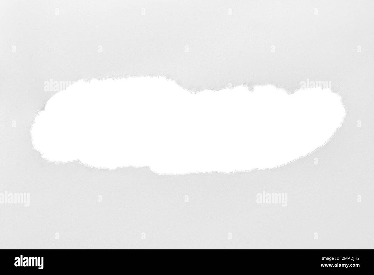 Torn white paper with shadow. Isolated Stock Photo - Alamy