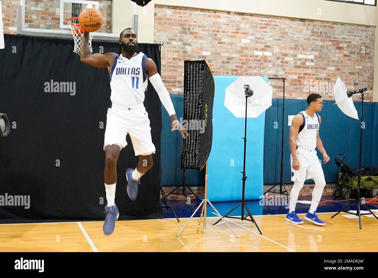 Dallas Mavericks forward Tim Hardaway Jr. (11) and center Dwight Powell ...