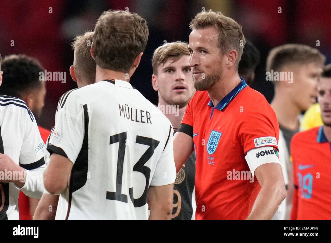 England's Harry Kane, right, looks to Germany's Thomas Muller at the end of the UEFA Nations ...