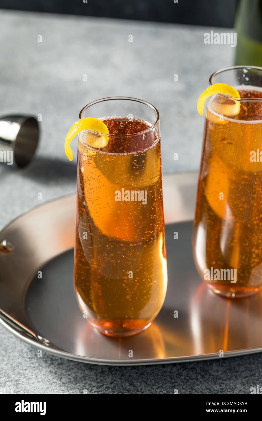 Boozy Refreshing French Kir Royale Champagne Cocktail with Lemon and ...