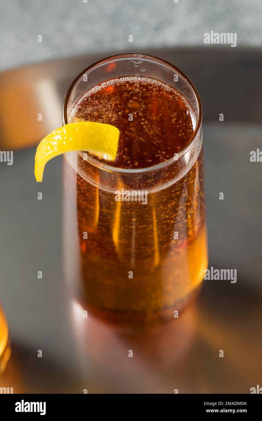 Boozy Refreshing French Kir Royale Champagne Cocktail with Lemon and ...