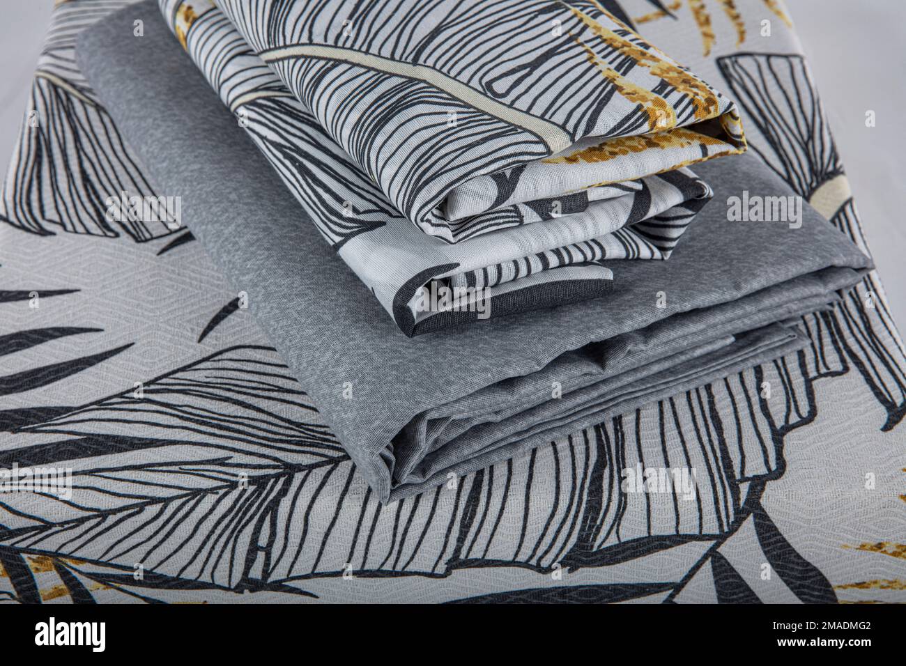 Linens set. Bedding set isolated on white. Set with stacks of clean bed ...