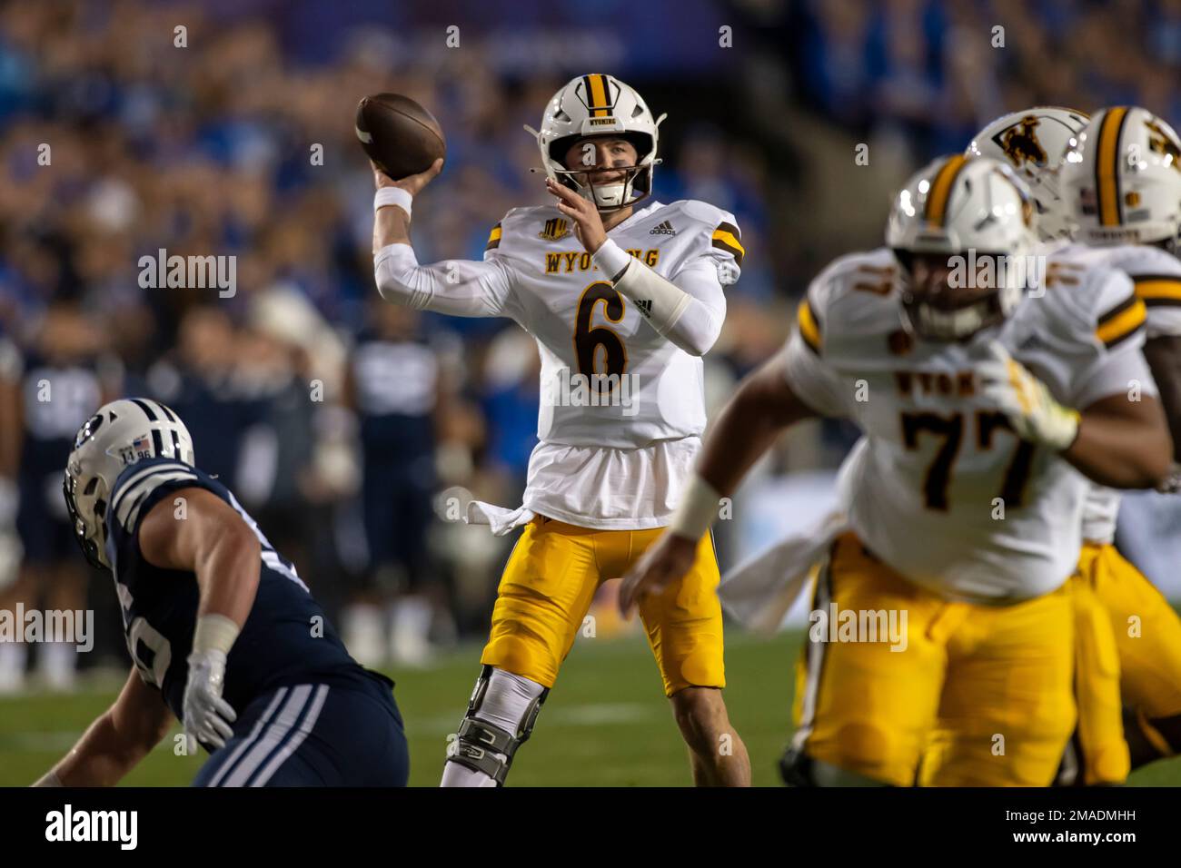Wyoming Cowboys quarterback Andrew Peasley (6) looks to pass the ...