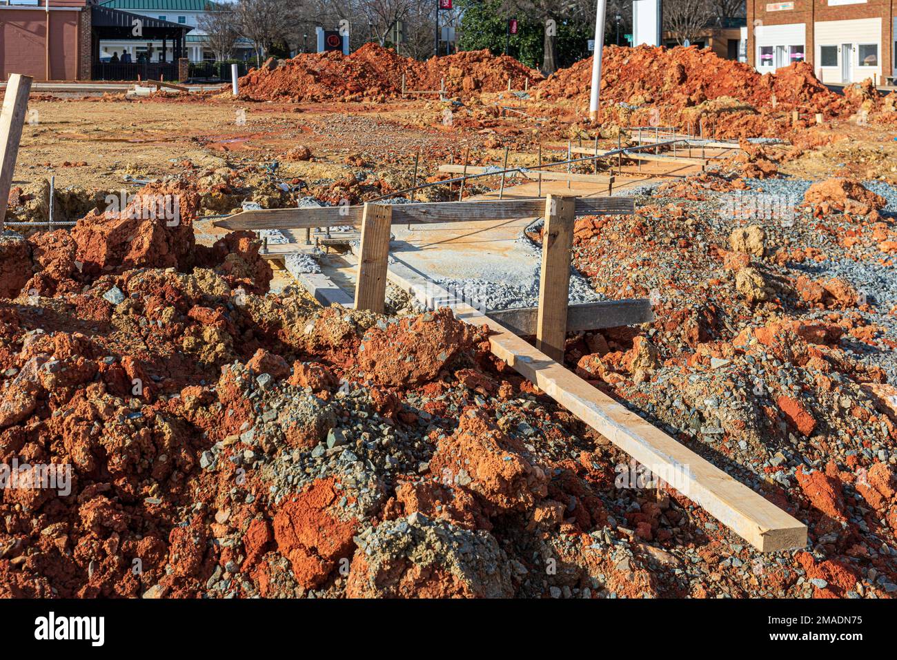 MATTHEWS, NC, USA-15 JANUARY 2023: Close up view of dirt, rebar, forms ...
