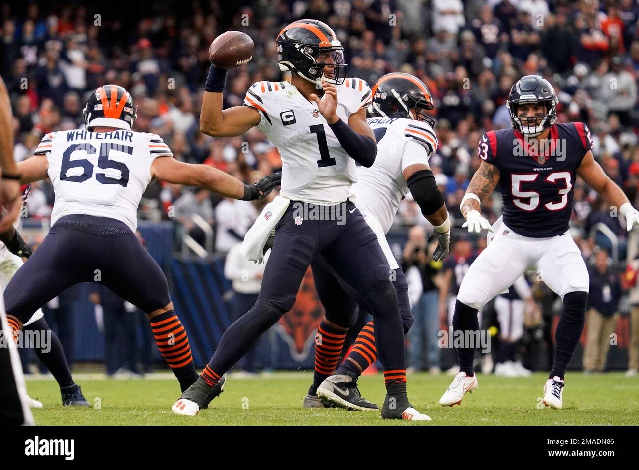 Chicago Bears quarterback Justin Fields looks to pass during the second ...