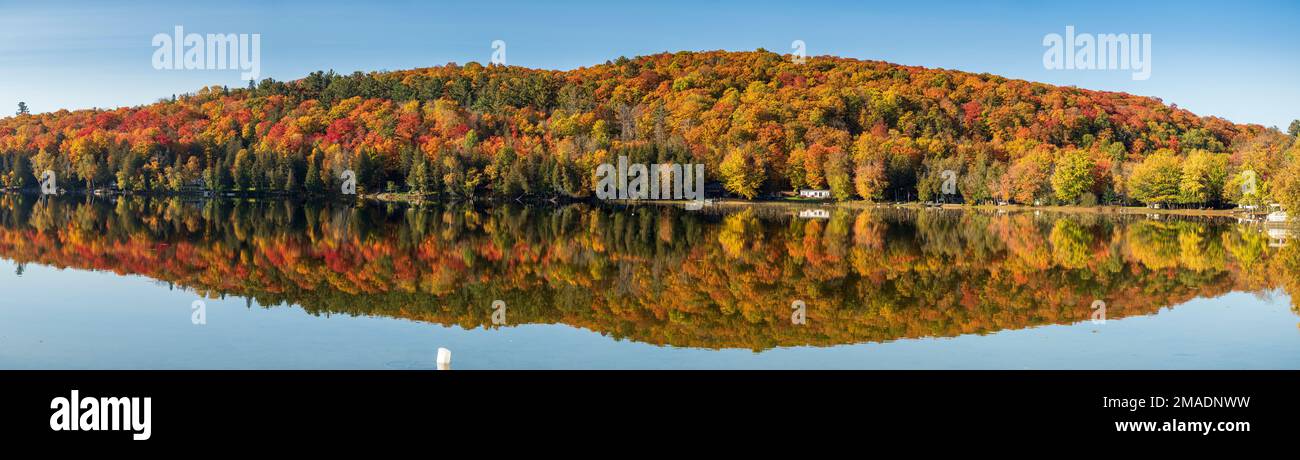 Lac Barnes in Autum Splendor: A calm lake in Quebec's Pontiac region ...