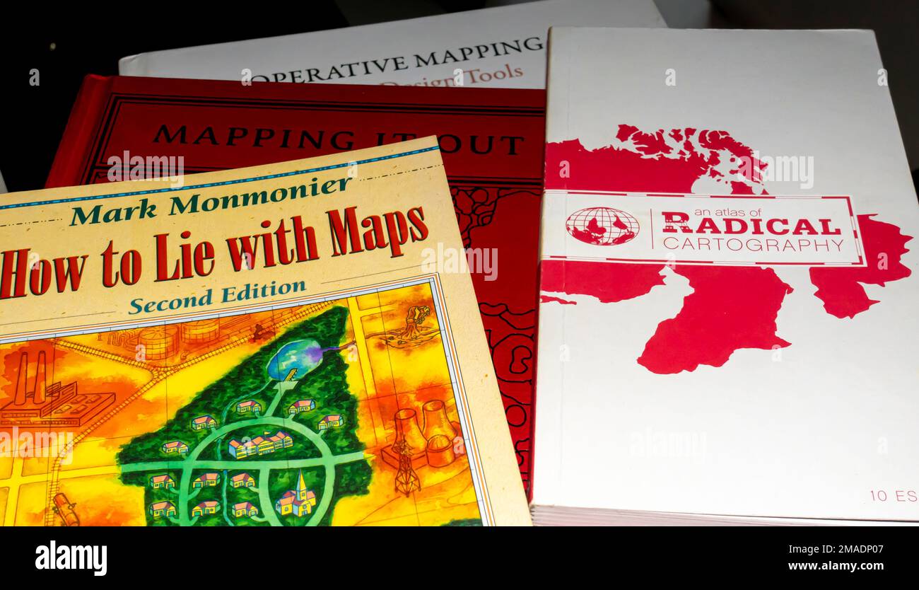 Books on mapping and cartography. Contemporary mapping studies Stock Photo - Alamy