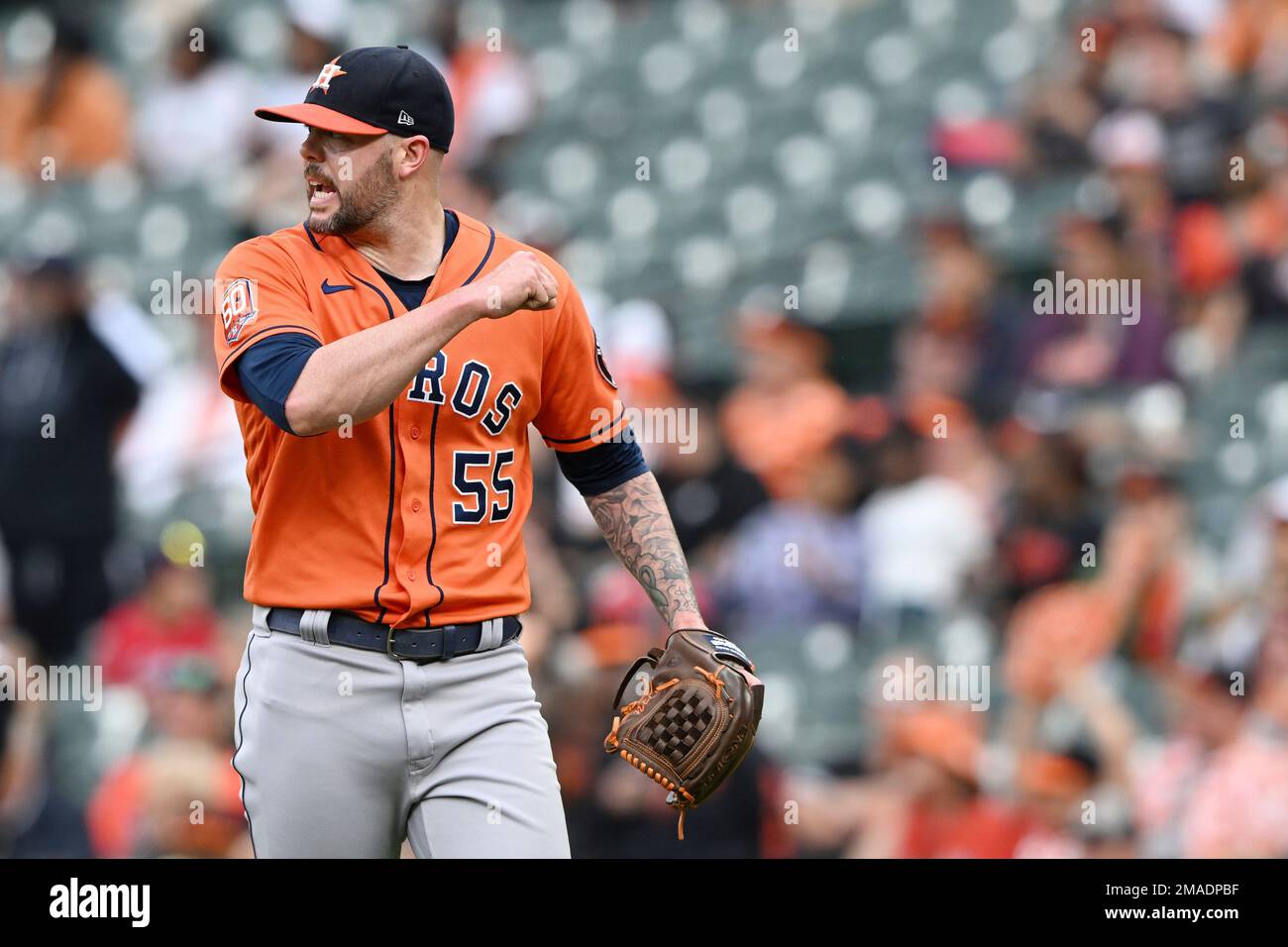 Houston Astros pitcher Ryan Pressly reacts after a double play in a ...