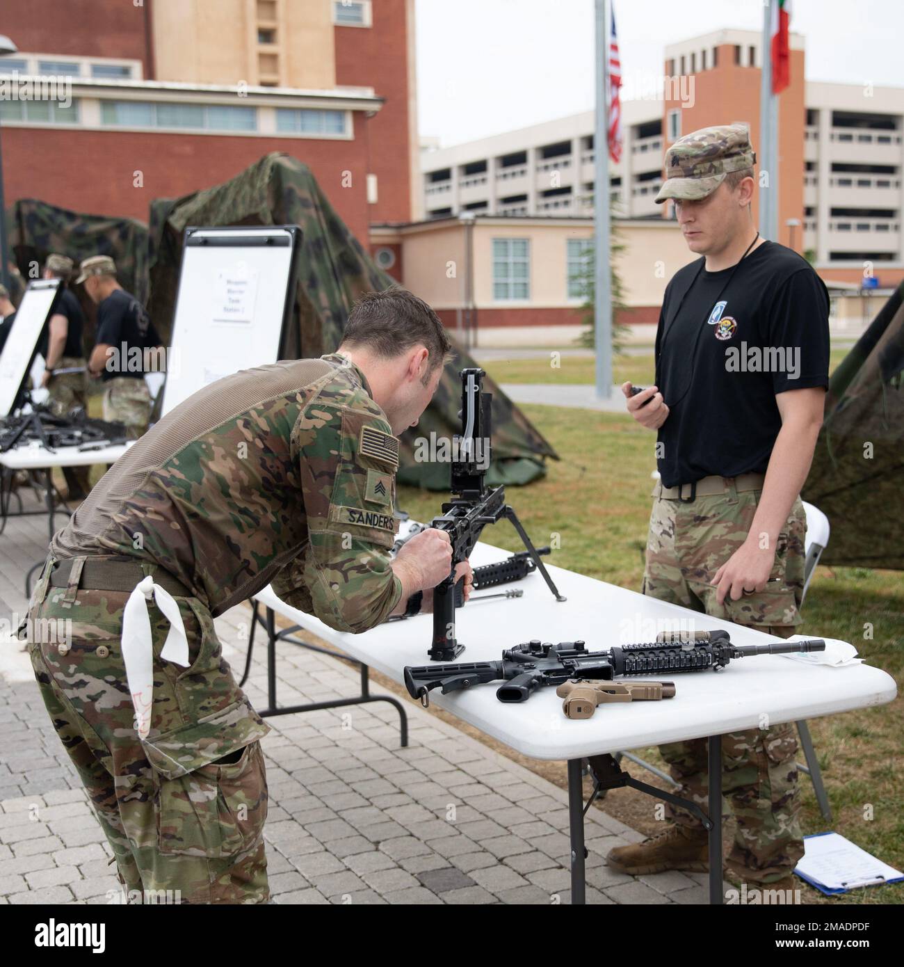 Sgt. Joseph Sanders executes the weapon assembly task immediately after ...