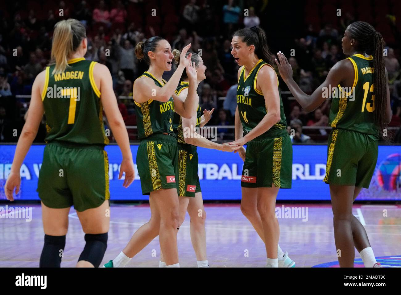 Australian players celebrate after defeating Canada during their game ...