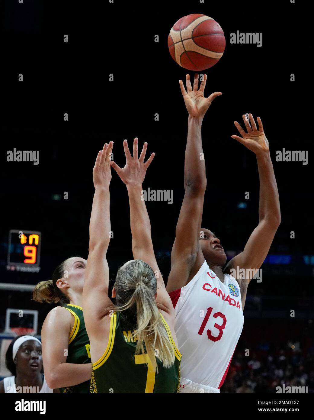 Canada's Shay Colley attempts a shot at goal as Australia's Tess Madgen ...